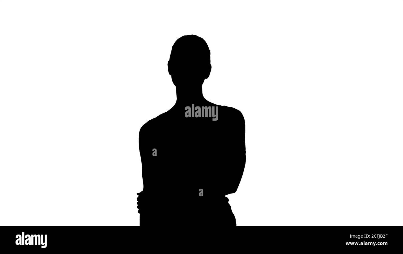 Silhouette Good-looking caucasian woman walking and smiling Stock Photo ...
