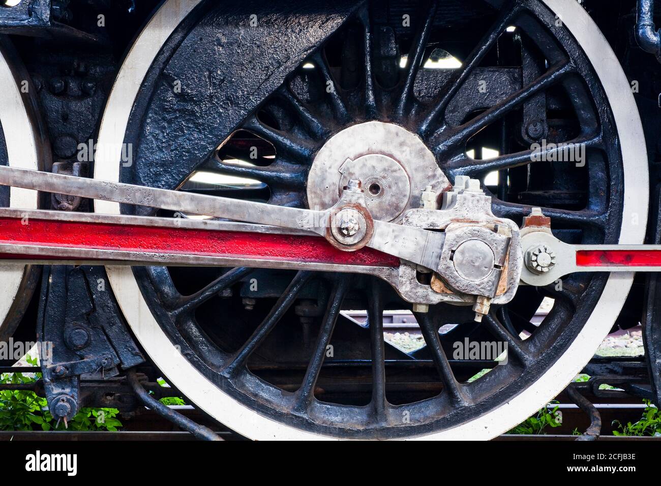 Industrial rail car wheels closeup photo Stock Photo - Alamy