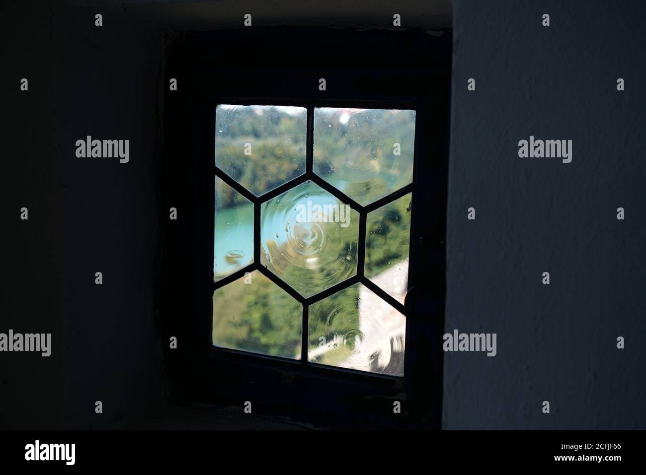 Beautiful nature seen through a small window Stock Photo - Alamy