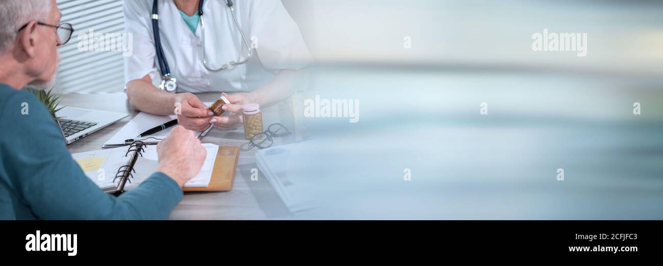 Female doctor explaining medicine to her patient in medical office ...