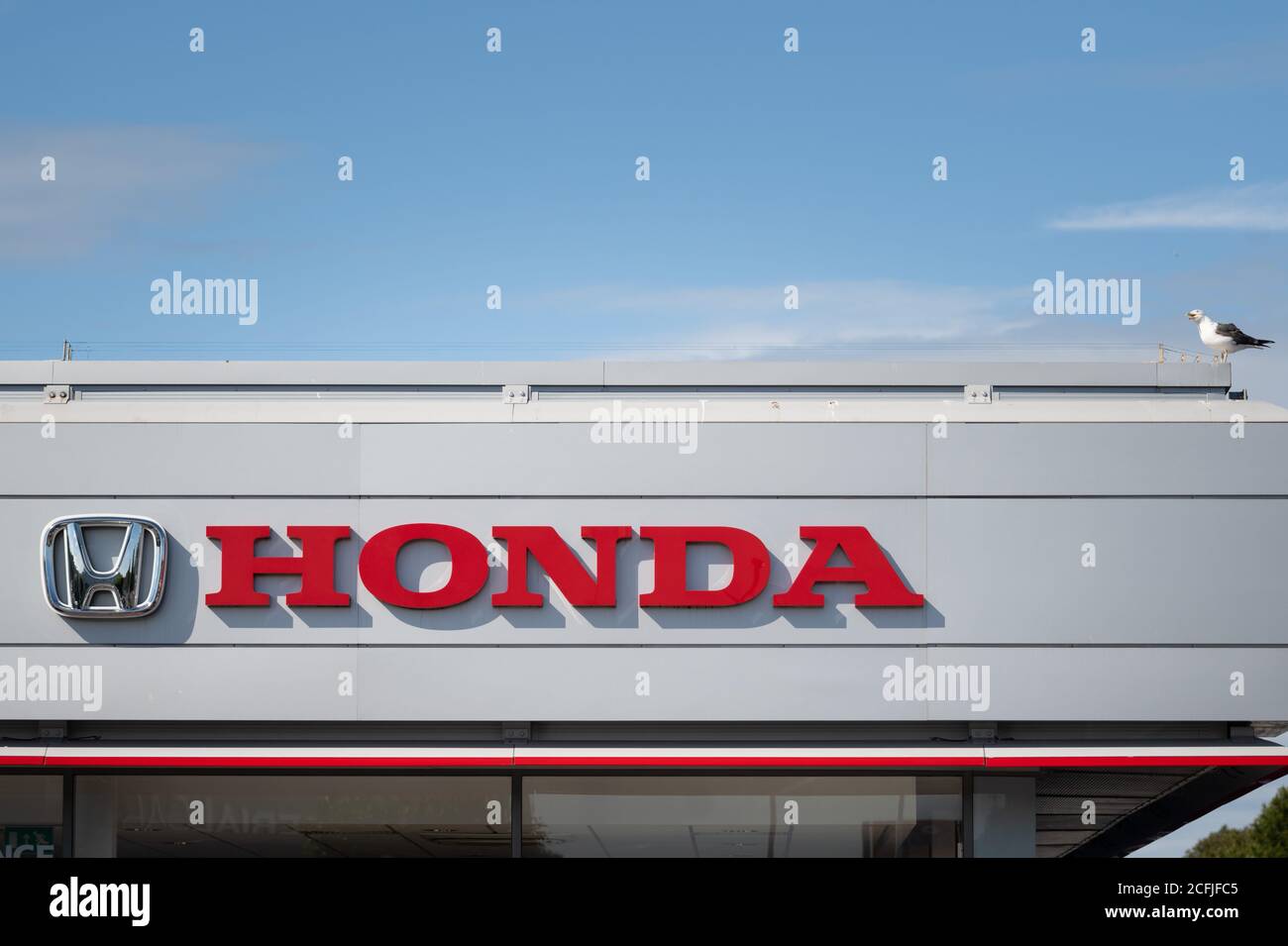 A Honda car garage sign Stock Photo - Alamy