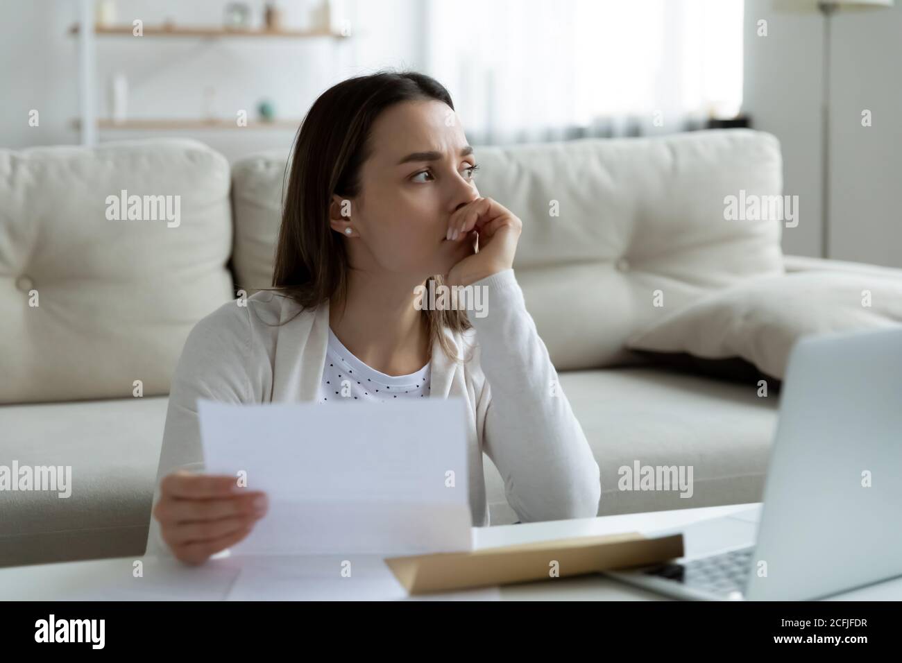 Worried lady thinking about problems hi-res stock photography and ...