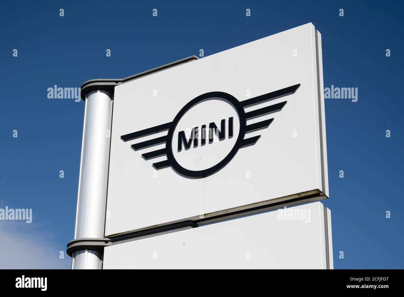 A close-up of a Mini car garage sign Stock Photo - Alamy