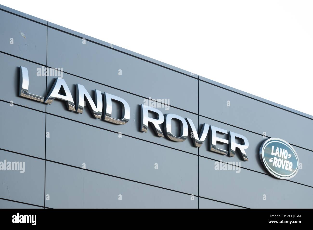 A Land Rover car garage sign Stock Photo - Alamy