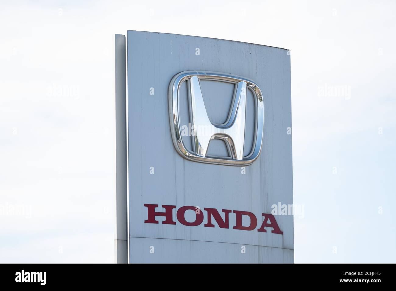 A Honda car garage sign Stock Photo - Alamy