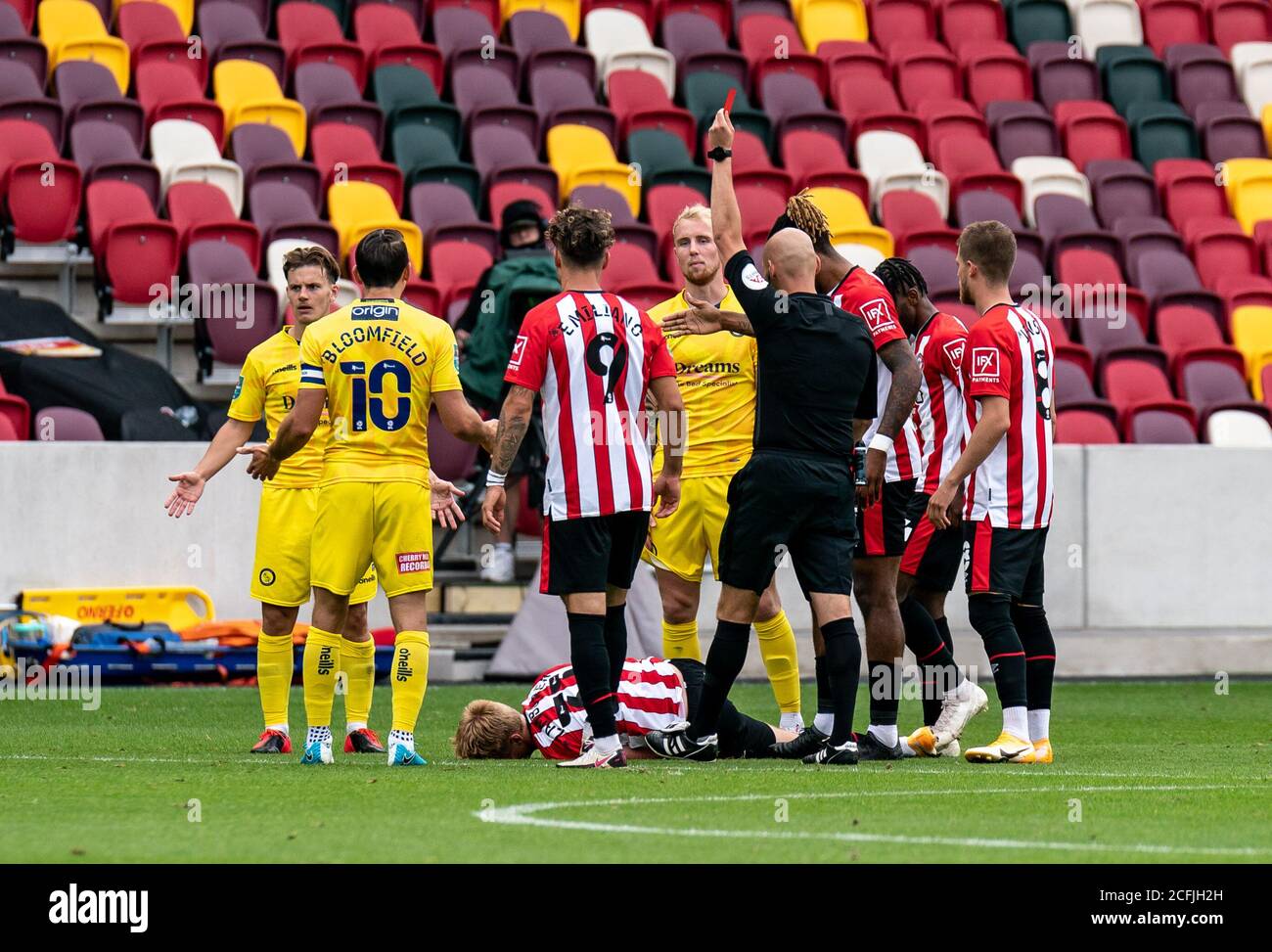 Brentford, UK. 06th Sep, 2020. Referee Charles Breakspear shows Dominic ...