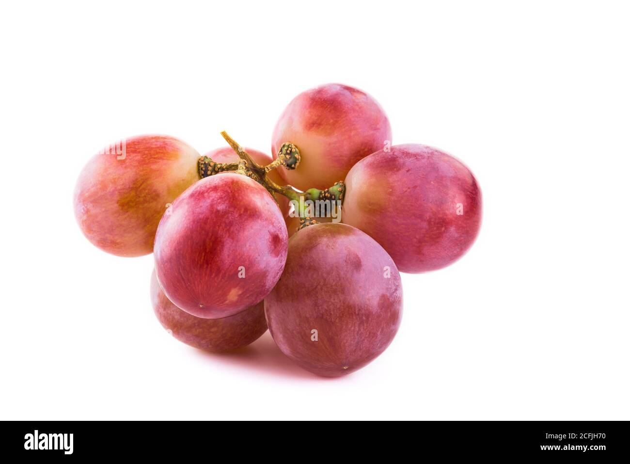 Ripe red grape isolated on white background Stock Photo - Alamy