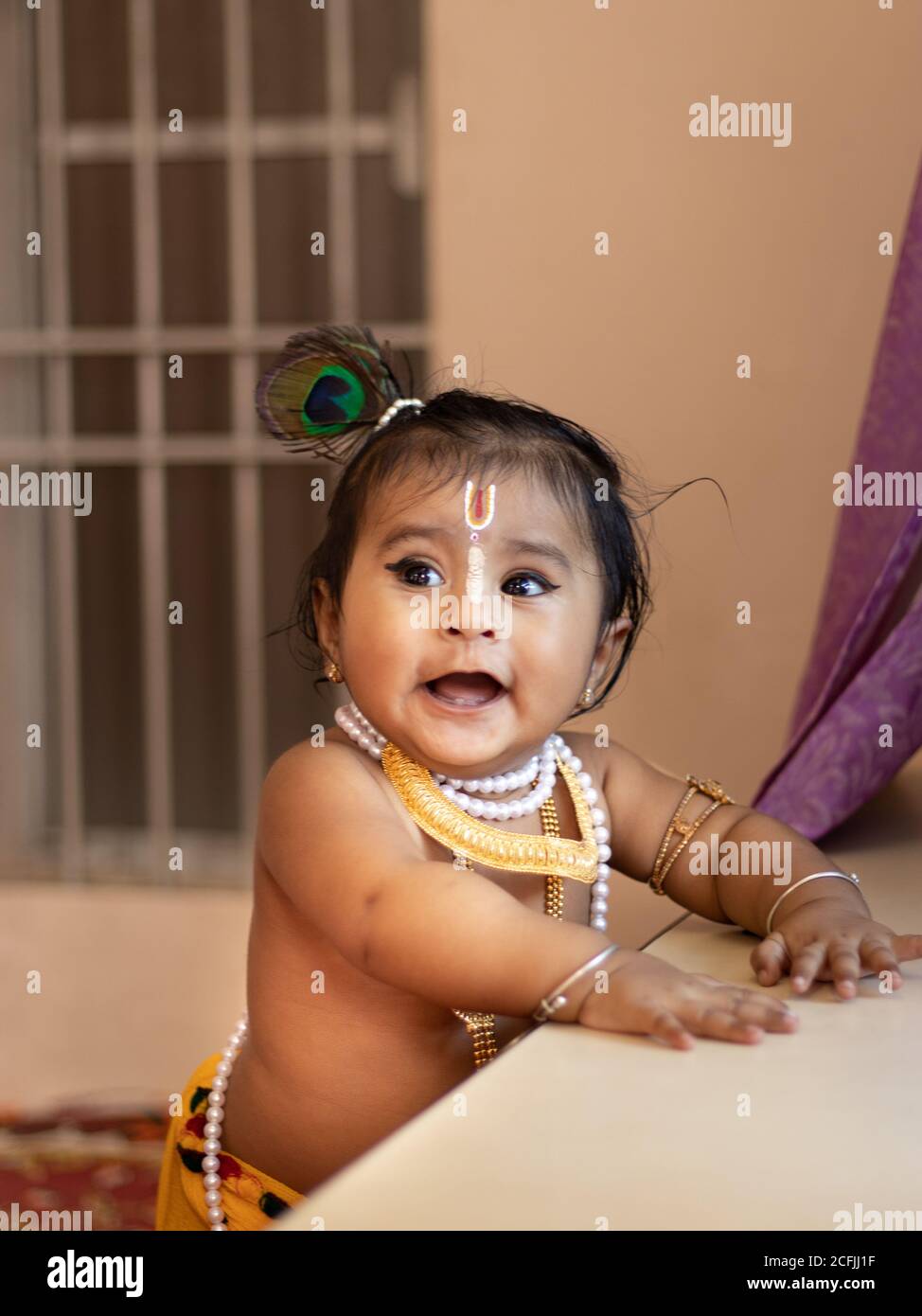 Kid dressed up lord krishna hi-res stock photography and images - Alamy