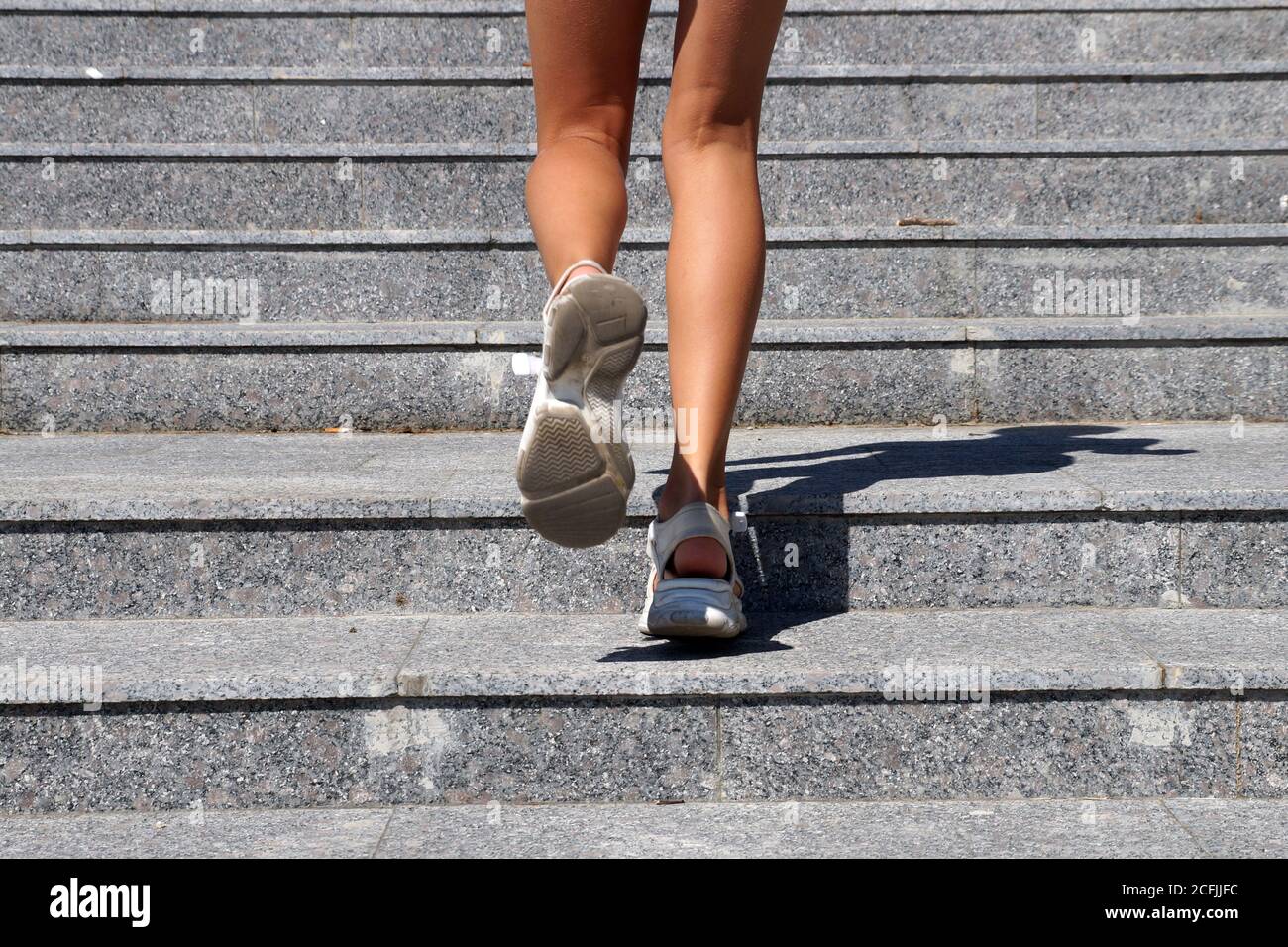 Girl stairs rear view hi-res stock photography and images - Alamy