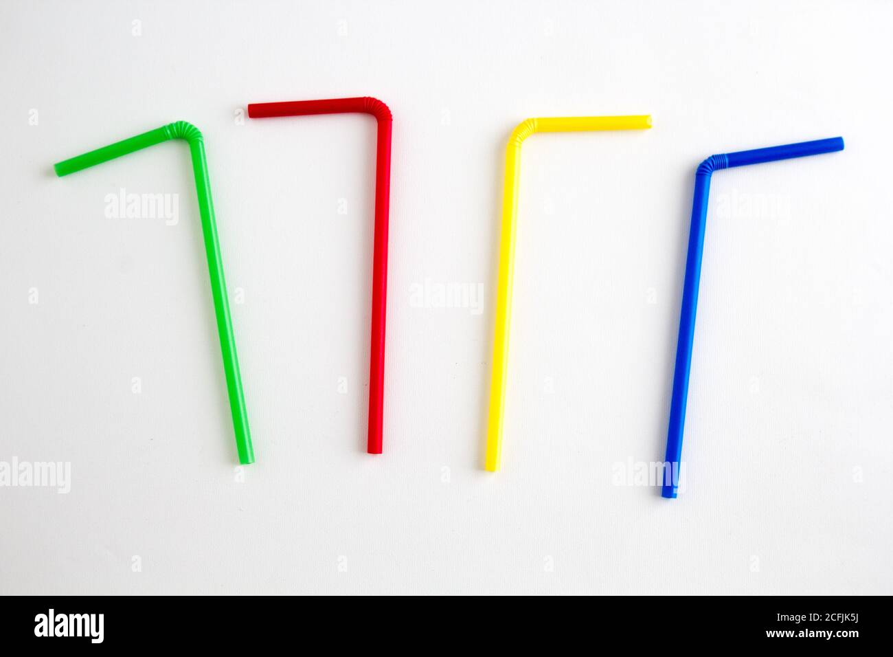 Flat lay of colorful bendy straws isolated on white background Stock ...