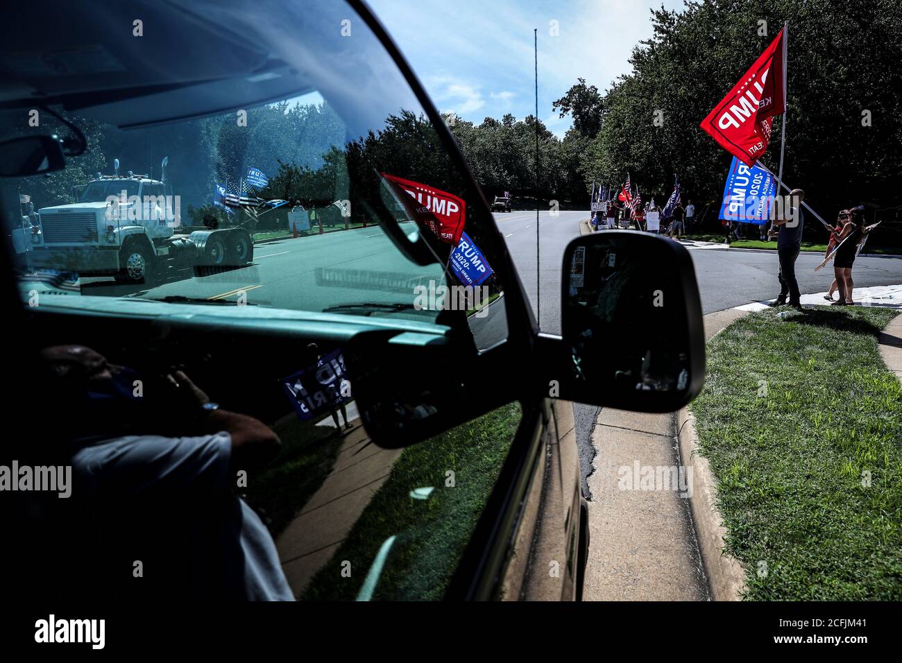 Protesters gather outside the Trump National Golf Club in Sterling, VA ...