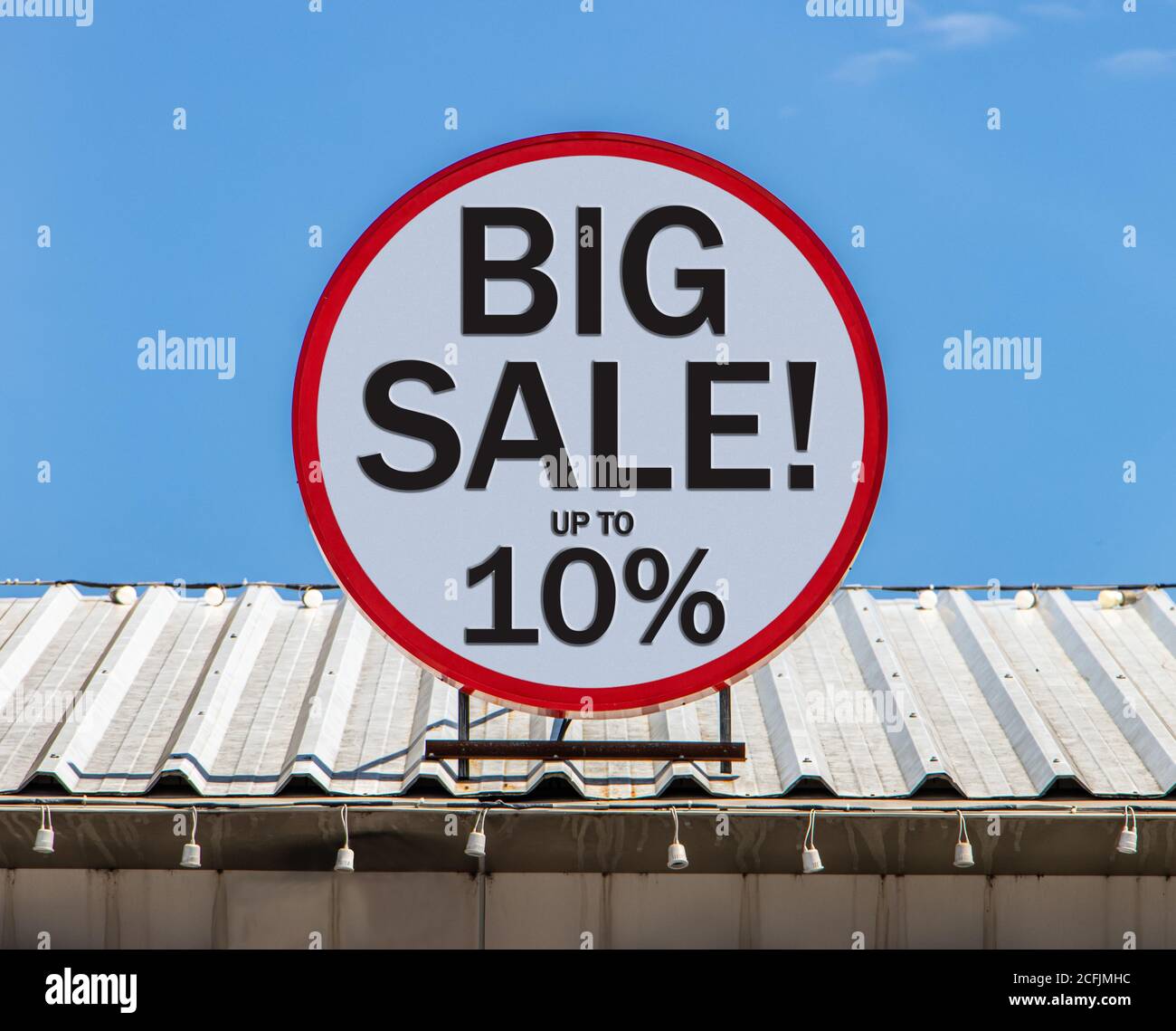 A Circle billboard with text shows BIG SALE is installed on a roof ...