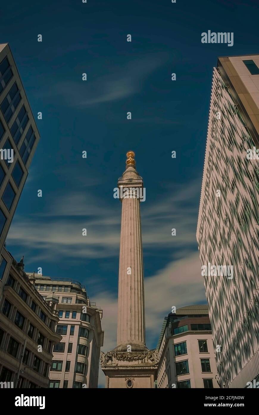 The Monument to the Great Fire of London which started near this spot ...