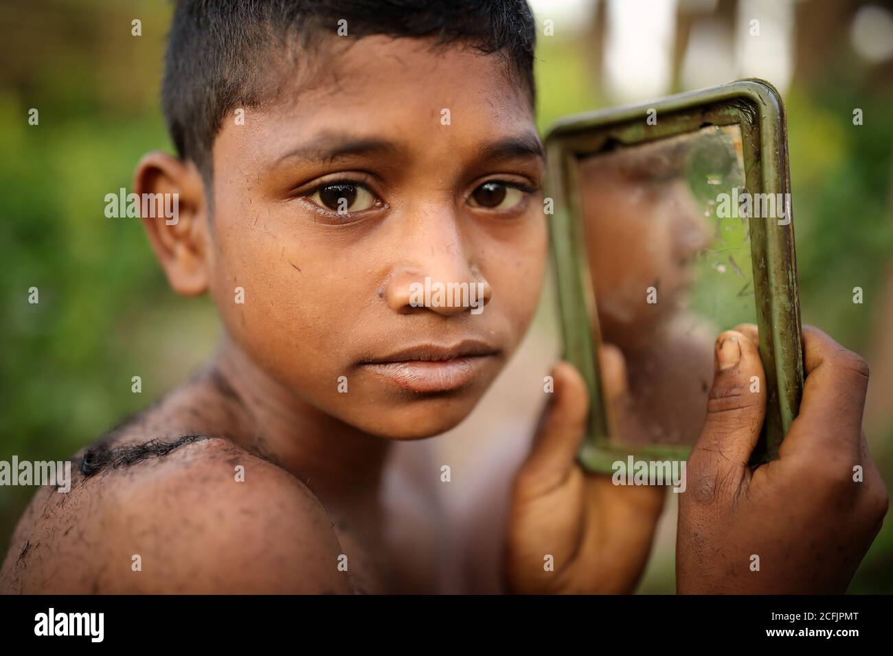 Tribal boy in a rural village in Kanger Valley National Park ...