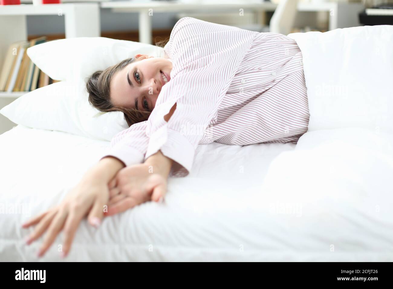 Serene woman lies in hi-res stock photography and images - Alamy