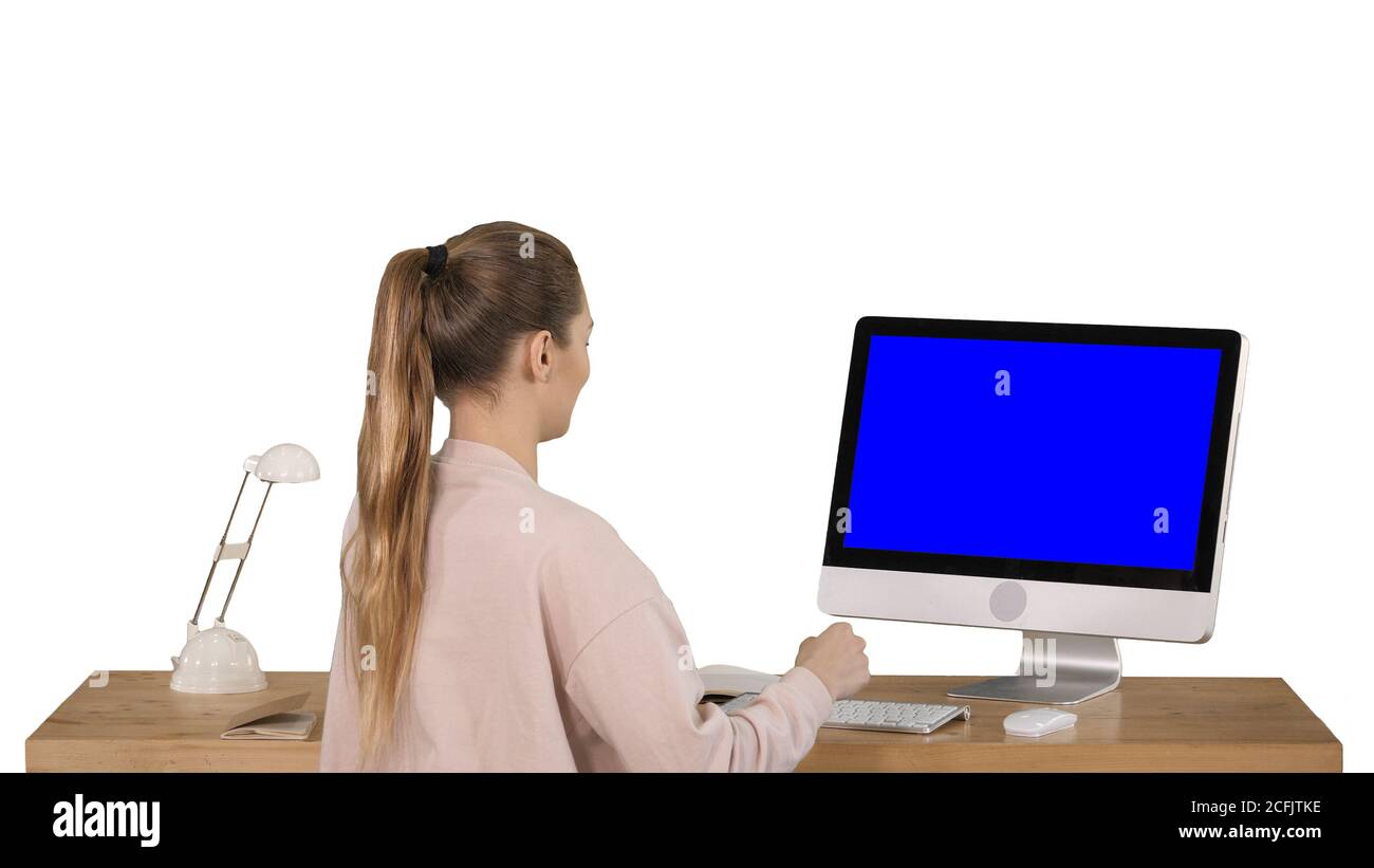 Attractive casual businesswoman working at office using pc Blue Screen ...