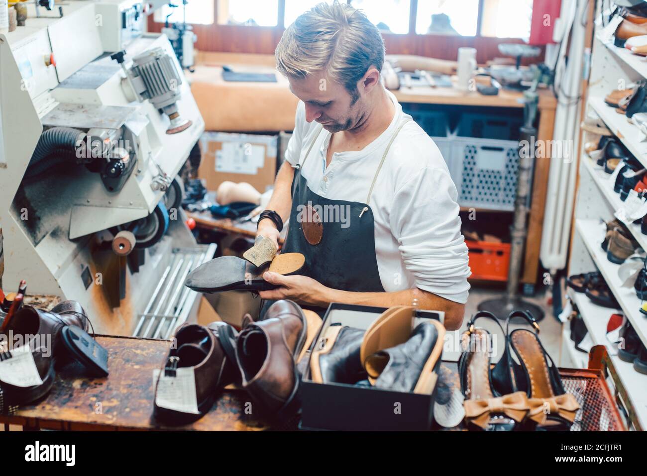 Shoes repair hi-res stock photography and images - Alamy