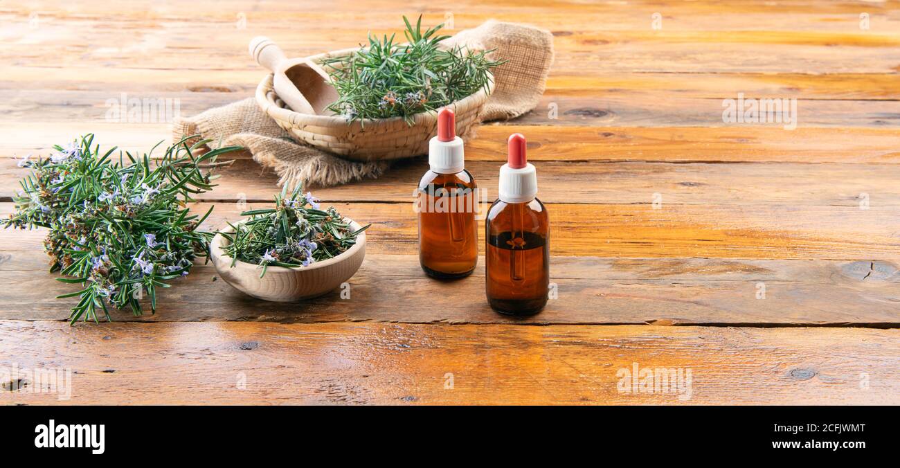homeopathic preparation of distilled oil with sprigs of rosemary Stock ...
