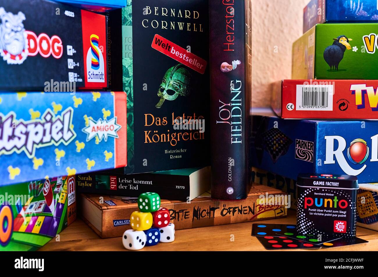 Berlin, Germany - September 6, 2020: Books and many different packs of ...