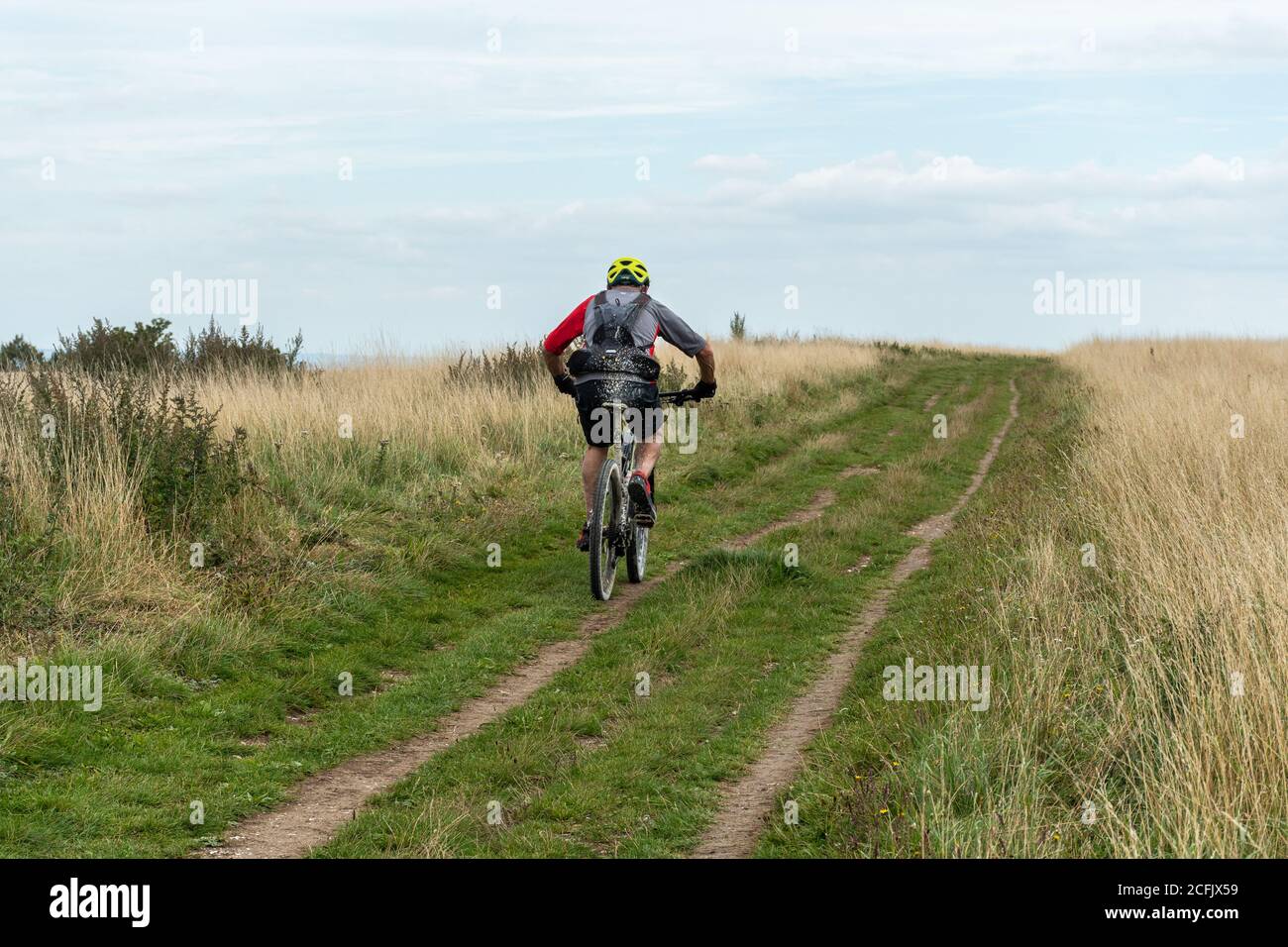 Man cycling along the Ridgeway Path, a historic National Trail ...