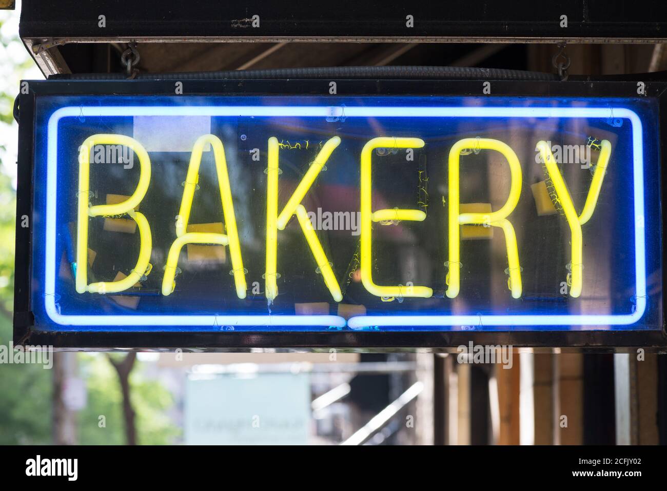 Bakery store neon sign background Stock Photo - Alamy