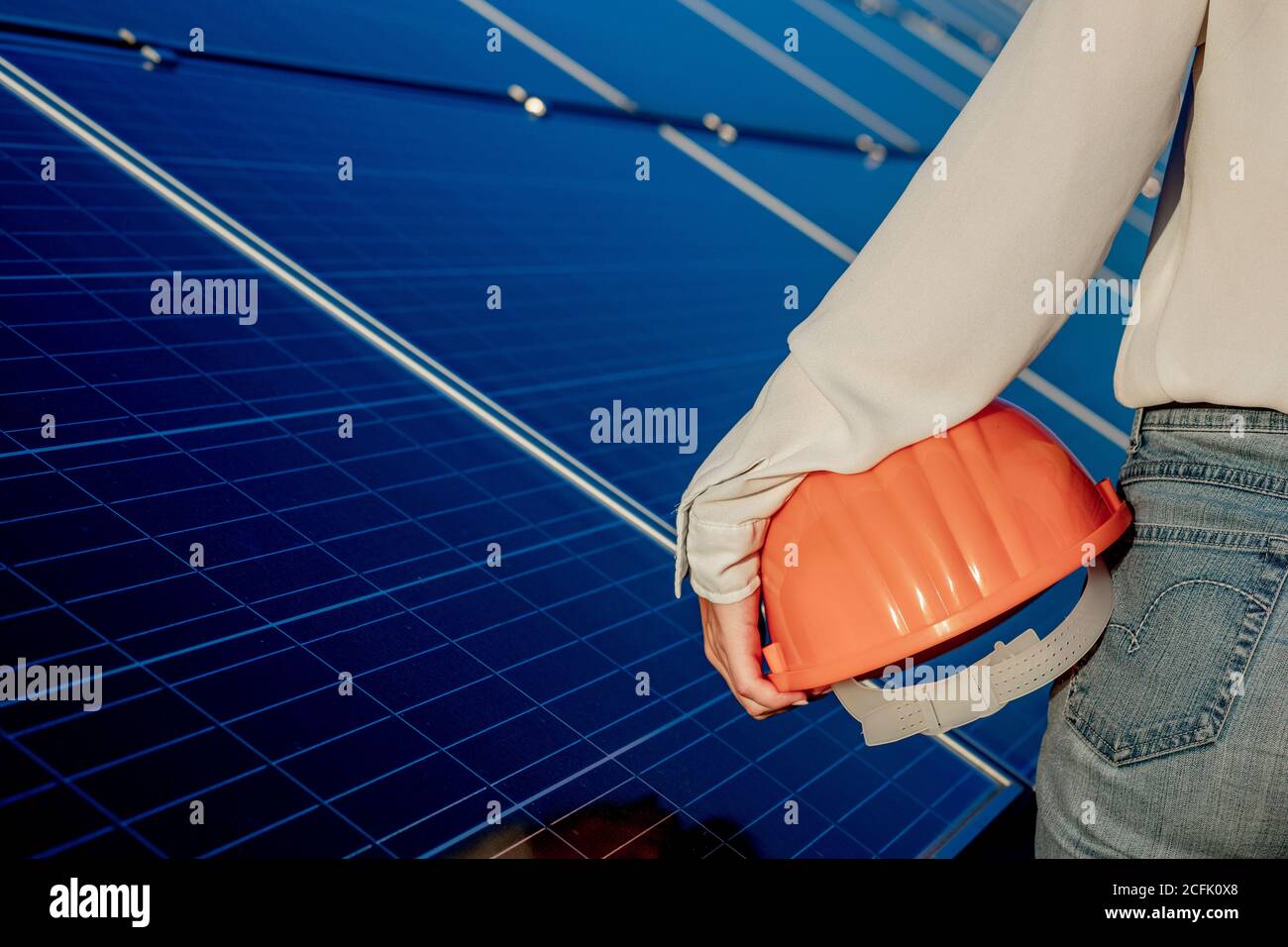 Female engineer holding energy panels hi-res stock photography and ...