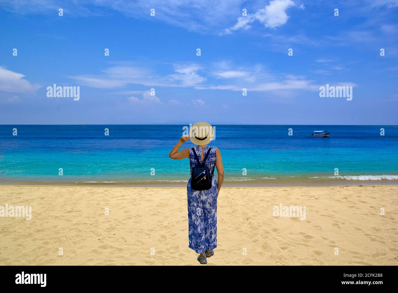Beautiful young woman on the beach in bali Stock Photo - Alamy