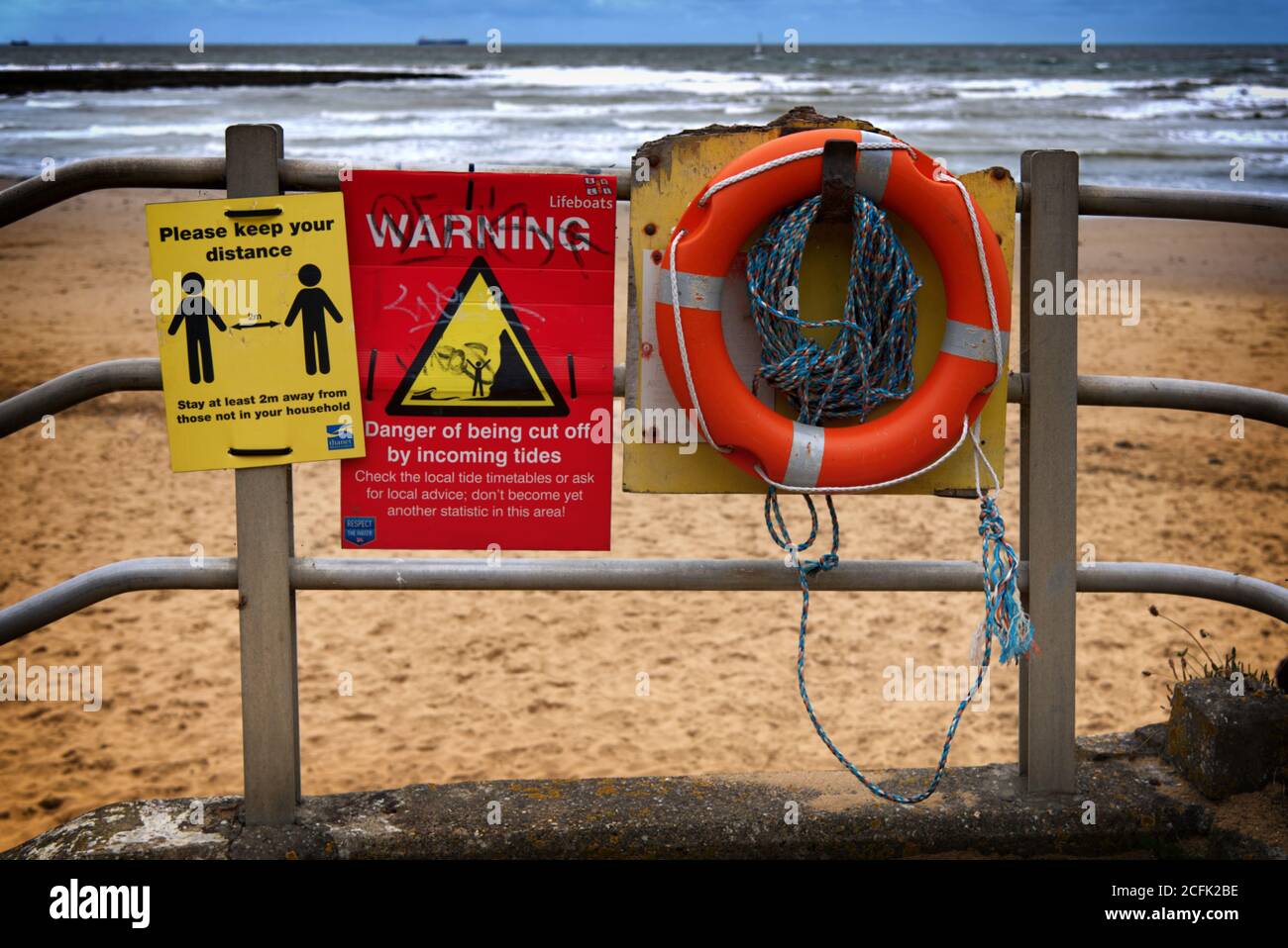 Warning Signs at the Beach Stock Photo - Alamy