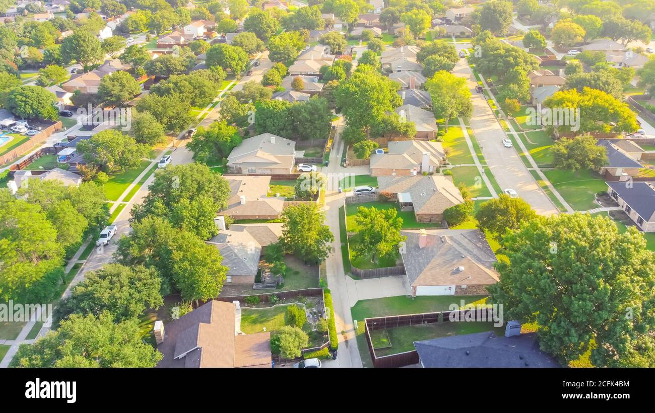 Bird eye view clean and peaceful neighborhood streets with row of ...