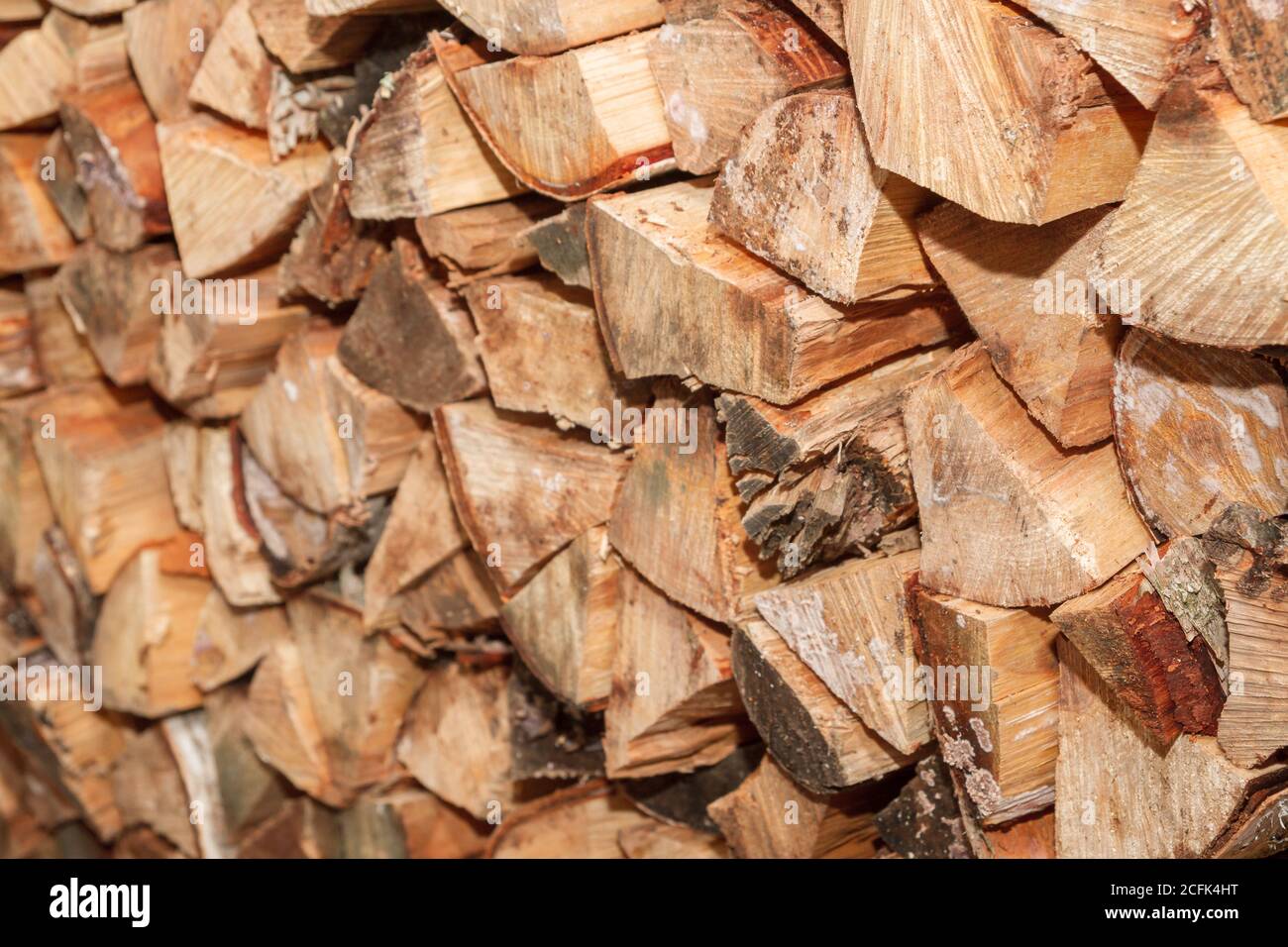 Pinned birch wood are in a pile in drevenice Stock Photo - Alamy