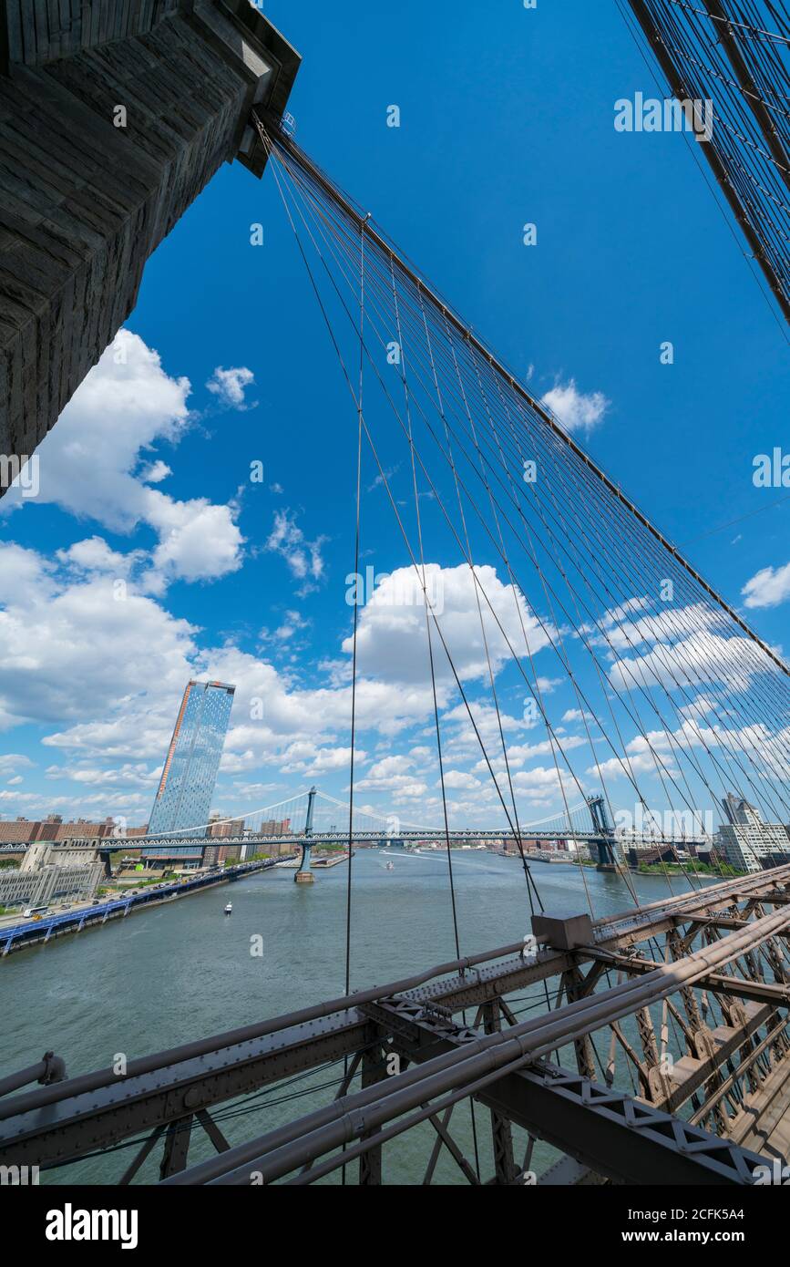 Clouds float in the sky above the Lower East Side Manhattan residences ...