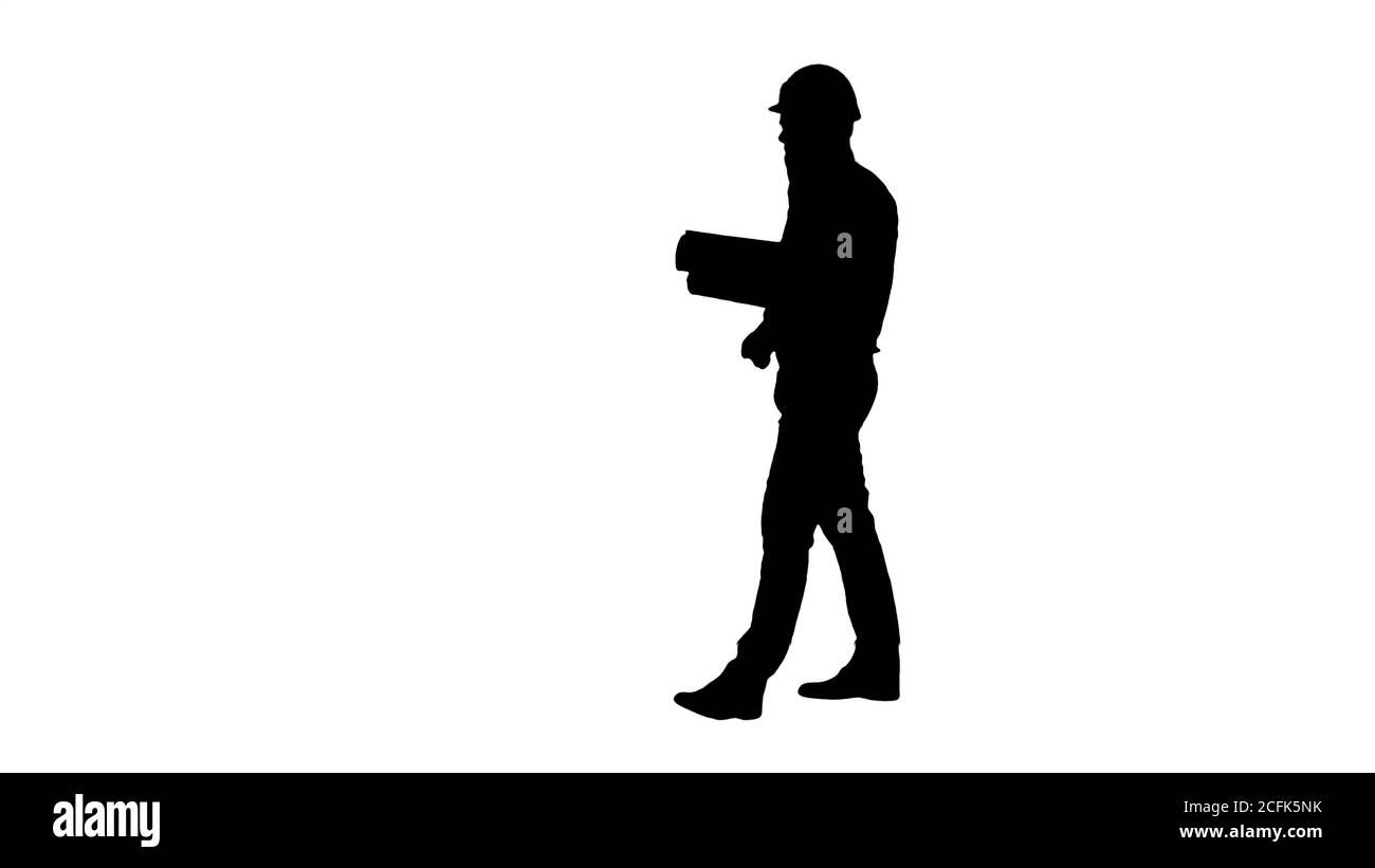 Silhouette Engineer talking on phone with paperwork Stock Photo - Alamy