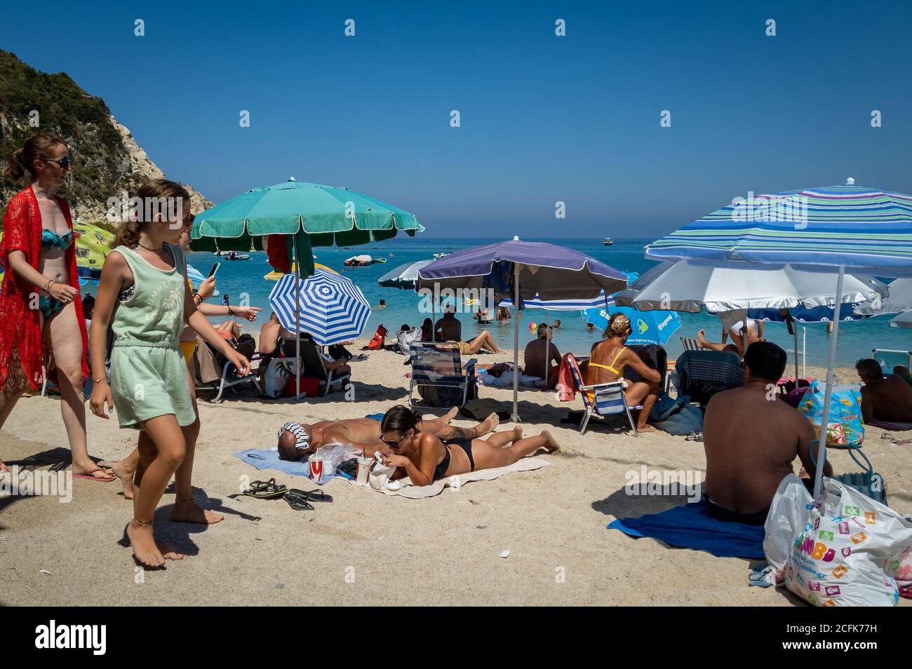 Tourists Enjoying A Beautiful Hot Summer Day On The Beach Of This 8159