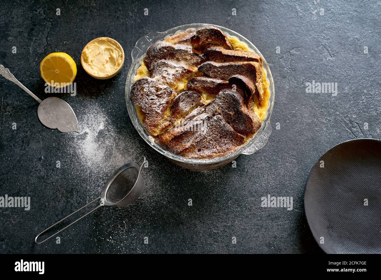 Top view of traditional bread pudding with custard, served with ...