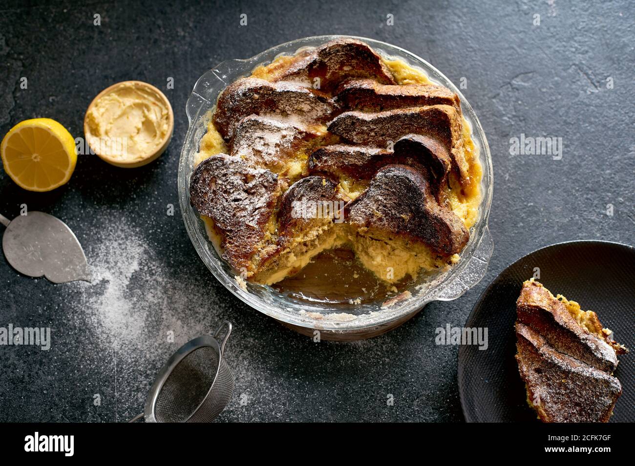Top view of traditional bread pudding with custard, served with ...