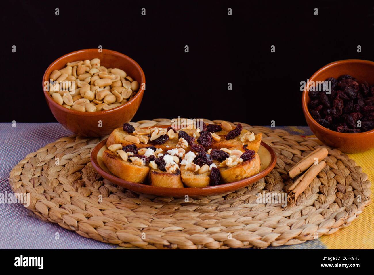 Capirotada surrounded by all the ingredients used to cook it Stock ...