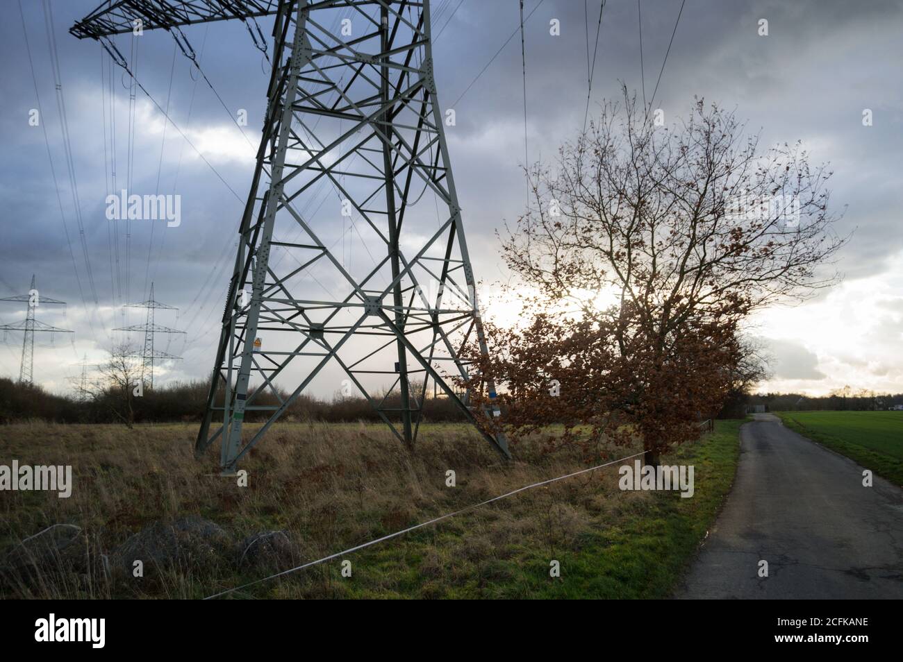 Utility Pole and Road during Sunset, Germany Stock Photo - Alamy