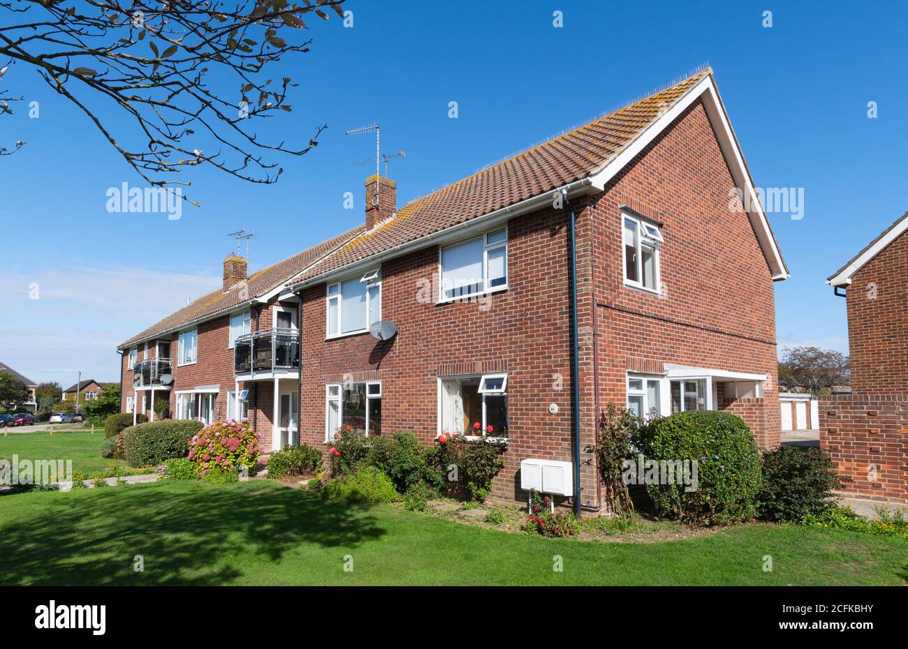 Row of British maisonettes in a quiet residential area in Rustington ...
