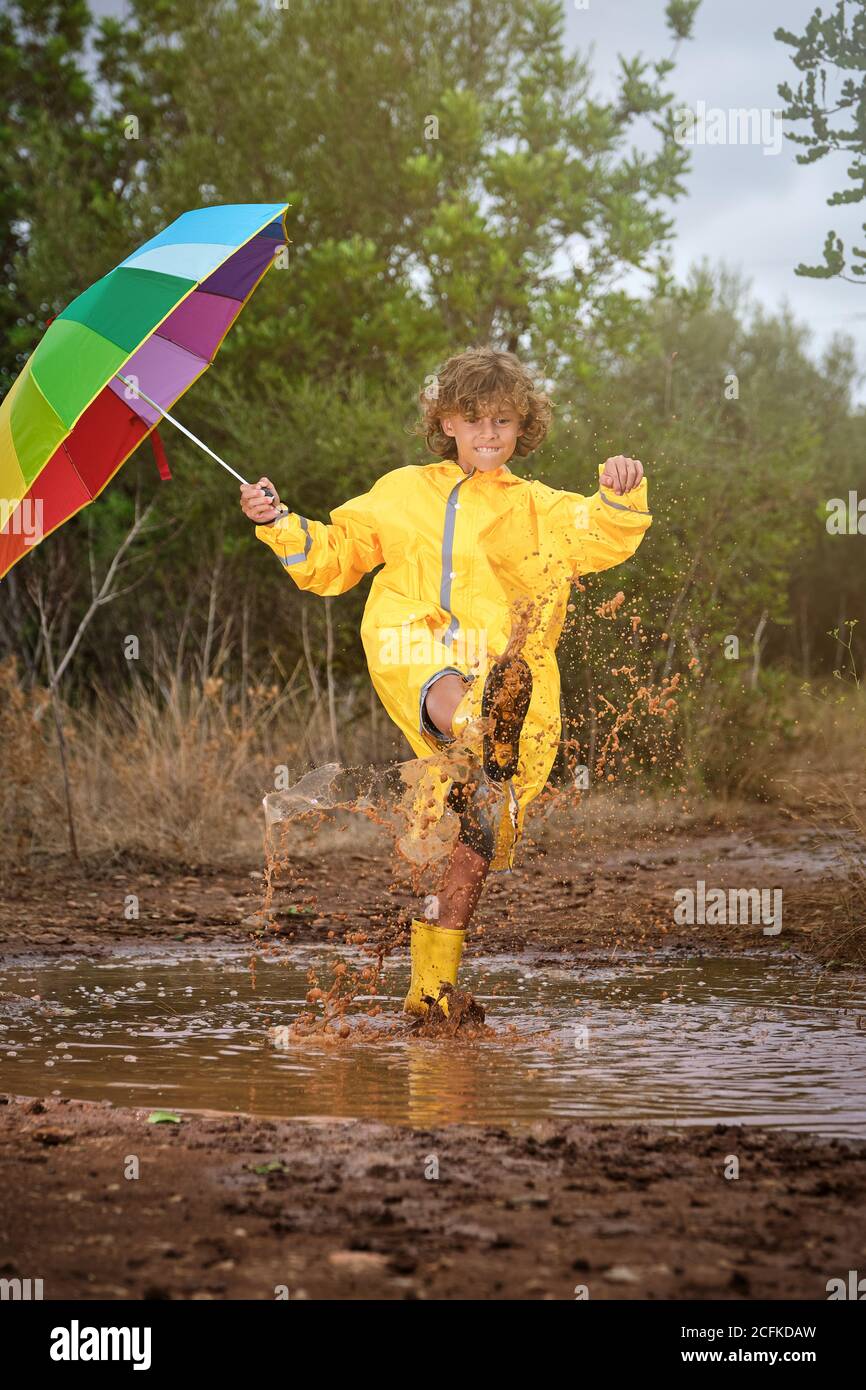 Boy puddle vertical hi-res stock photography and images - Alamy