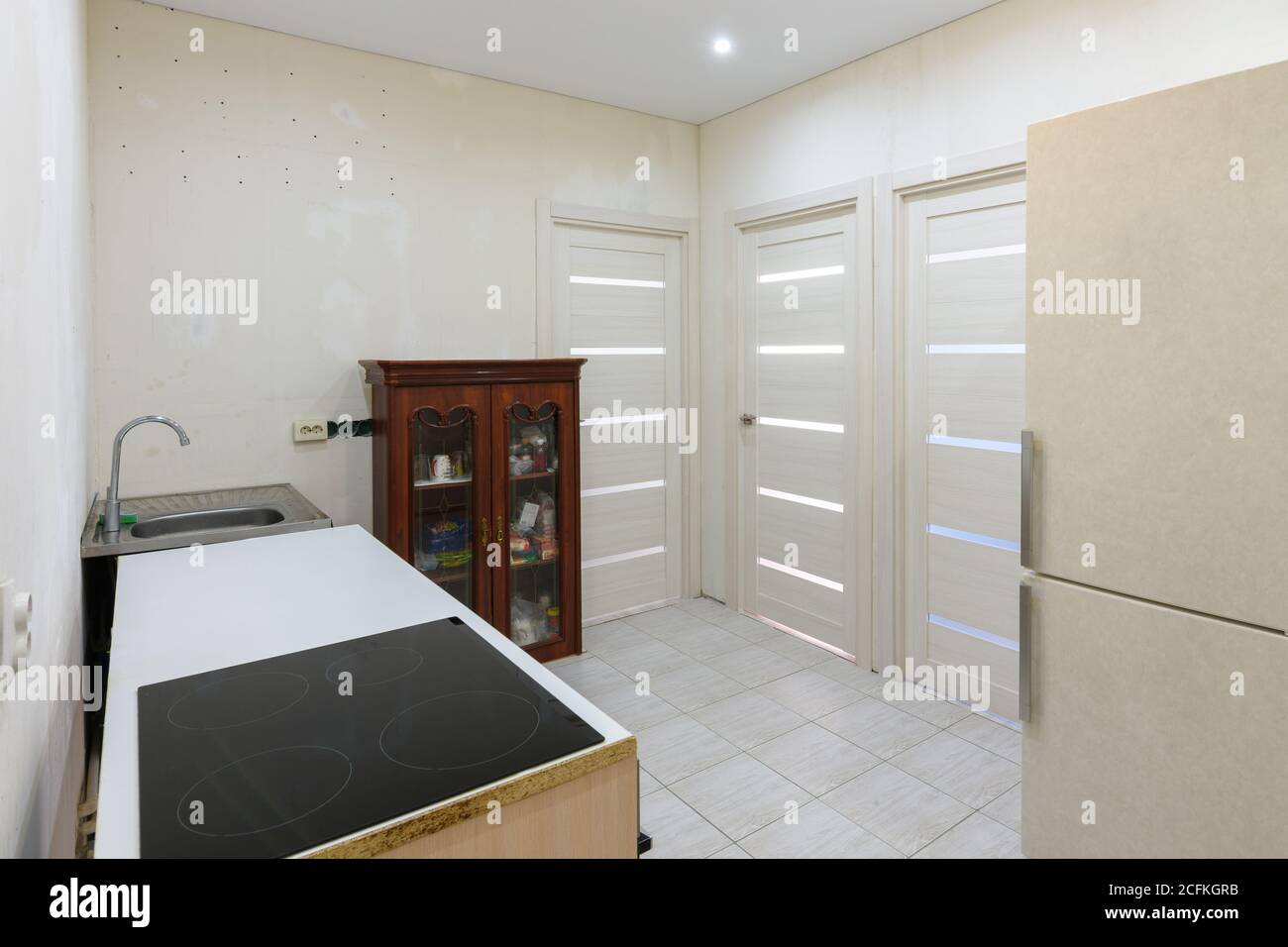 Kitchen interior with temporary poor furniture in a new building Stock ...