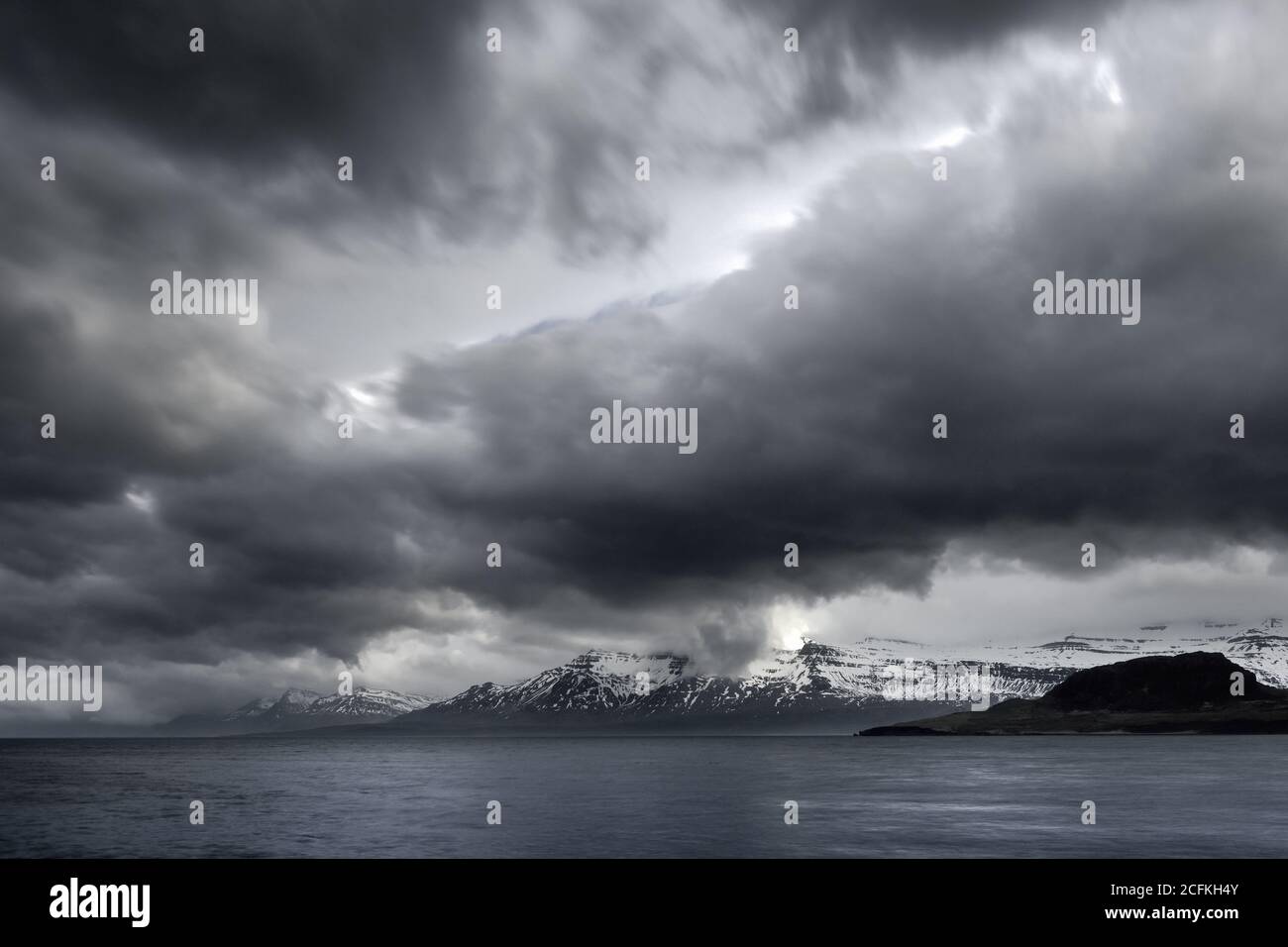 Coastal fjord landscape and mountains of Reyðarfjörður Stock Photo - Alamy