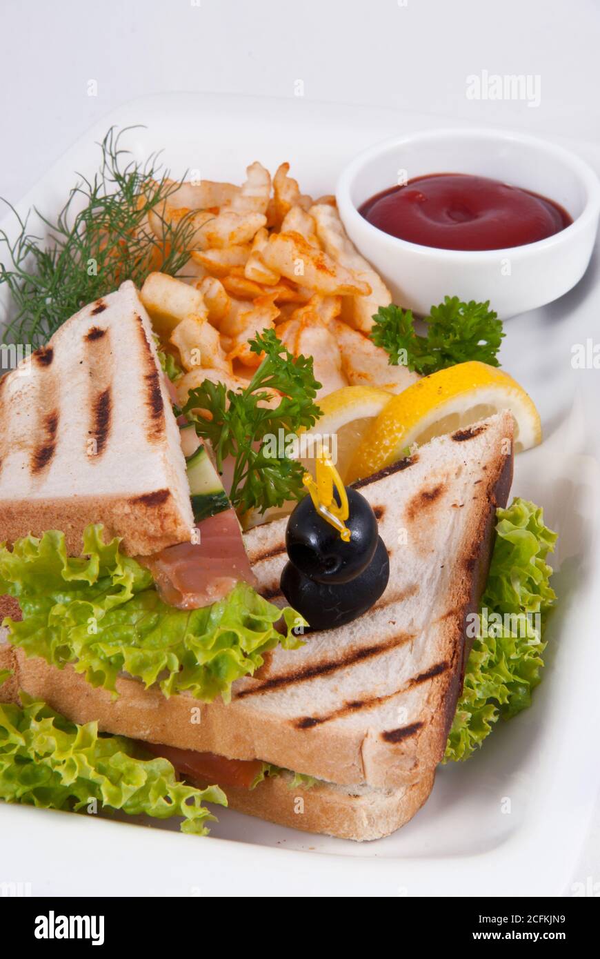 Pressed and toasted stuffed panini Stock Photo - Alamy