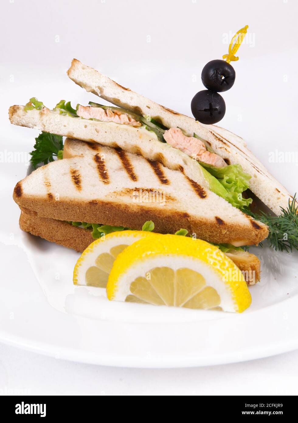 Pressed and toasted stuffed panini Stock Photo - Alamy