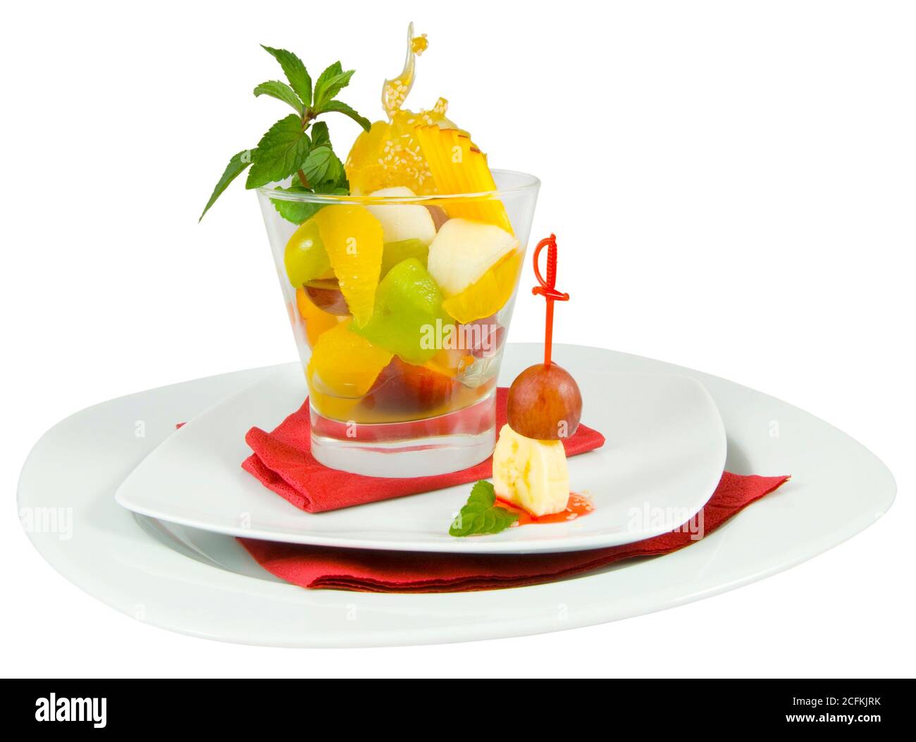 Tasty salad in white plate Cut Out Stock Images & Pictures - Alamy