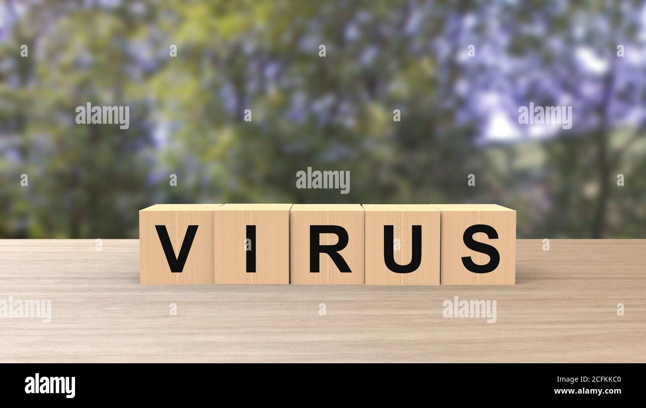 Virus - word wooden cubes on table horizontal over forest trees, corona ...