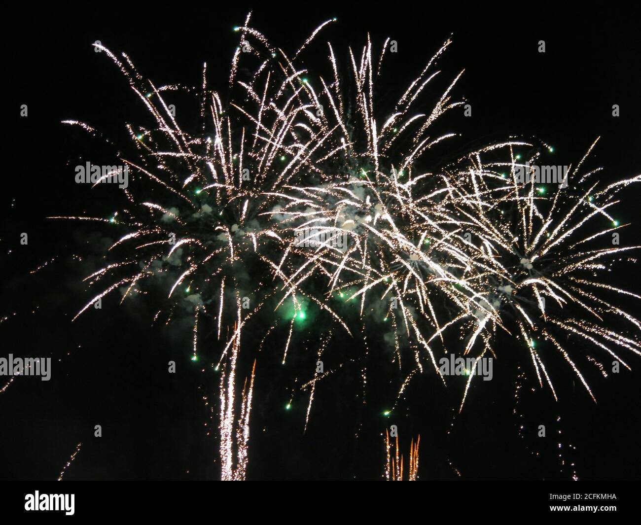Exploding star shapes in the sky from a fireworks display Stock Photo ...
