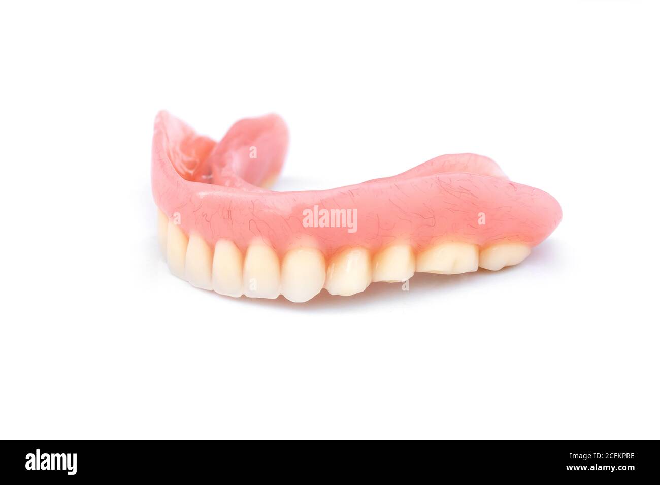 Acrylic dentures isolated on white background. Removable dentures ...
