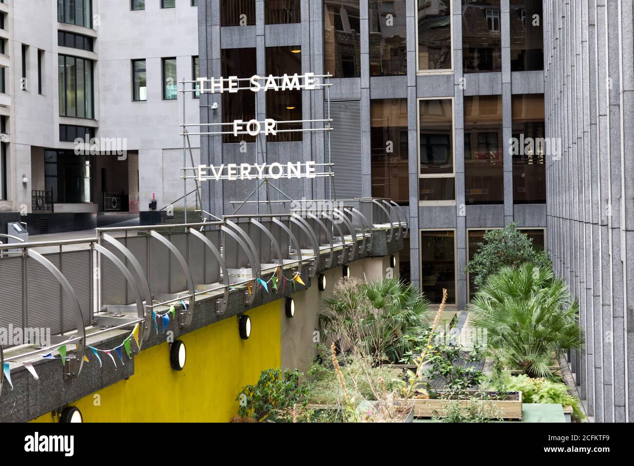 The same for everyone, sign and inner city gardens London Stock Photo ...