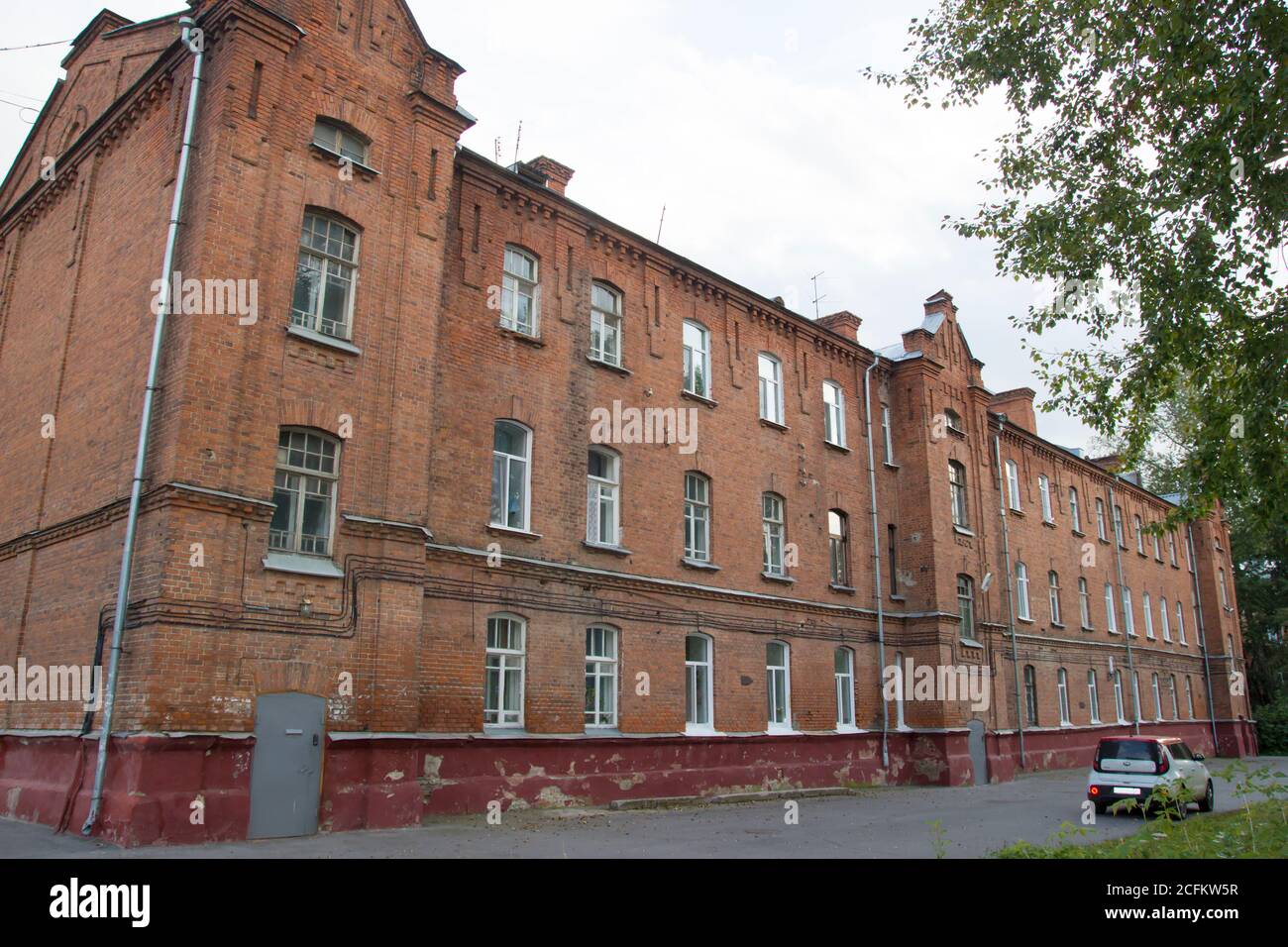 Old brick building in the Siberian city of Tomsk. The street of the ...