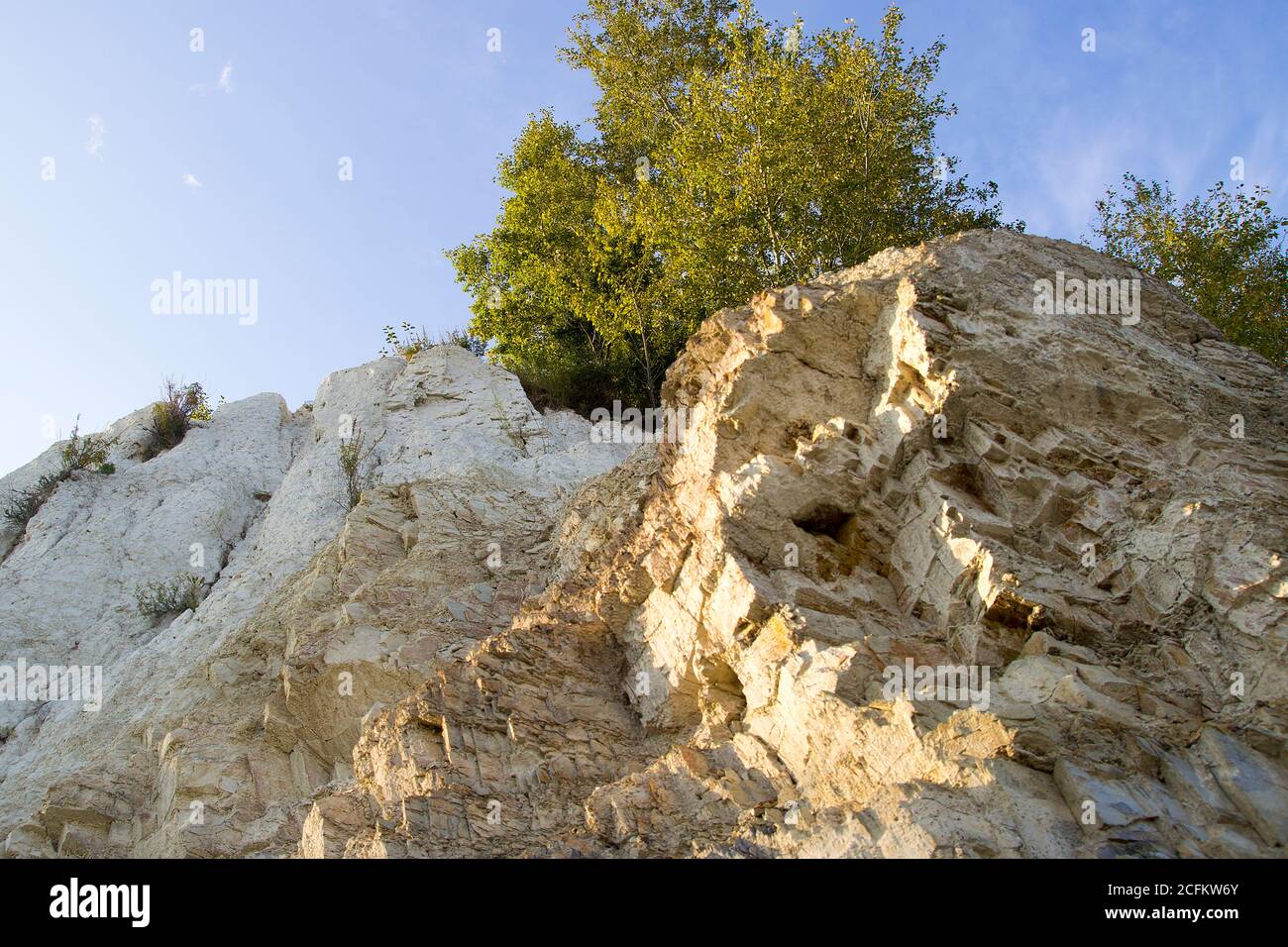 Cliff of rock mountain, Cracks and layers of sandstone. Stone textures ...